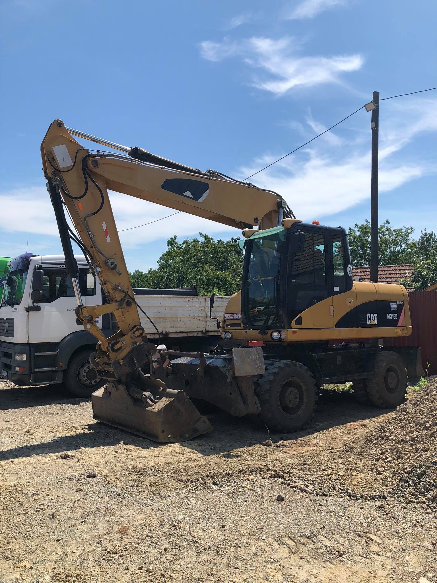 Caterpillar 316 D Gumikerekes forgókotró | Bérléscentrum